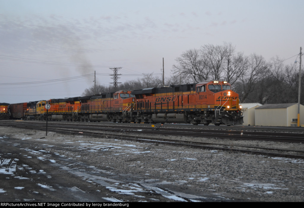 BNSF 8014 departs with the KCKTUL